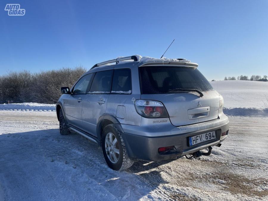 Серый Мицубиси Аутлендер 2005 в Вевис, объемом двигателя 2.40 л и пробегом 225 тыс. км за 2000 €, фото 4 на AUTOMOTO.COM.LV