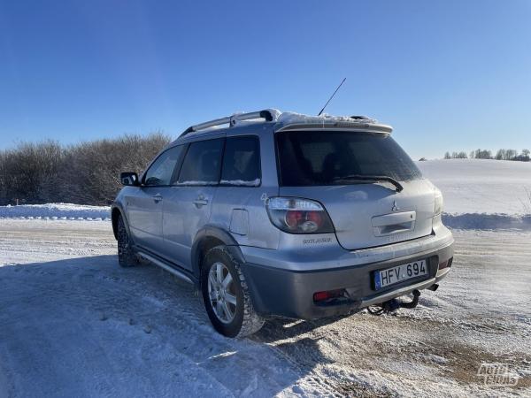 Серый Мицубиси Аутлендер 2005 в Вевис, объемом двигателя 2.40 л и пробегом 225 тыс. км за 2000 €, фото 4 на AUTOMOTO.COM.LV