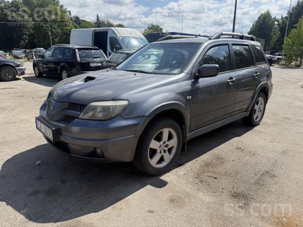 Pelēks Mitsubishi Outlander 2005 Rīga, ar dzinēja tilpumu 2.00 L un nobraukumu 300 tūkst. km par 1250 €, foto 1 vietnē AUTOMOTO.COM.LV