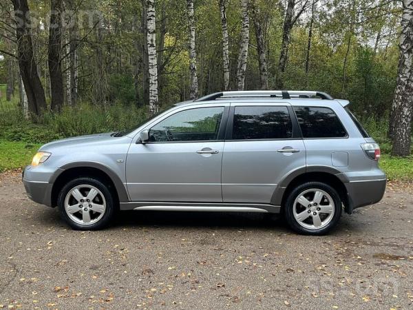 Pelēks Mitsubishi Outlander 2005 Rīga, ar dzinēja tilpumu 2.40 L un nobraukumu 0 tūkst. km par 2799 €, foto 3 vietnē AUTOMOTO.COM.LV