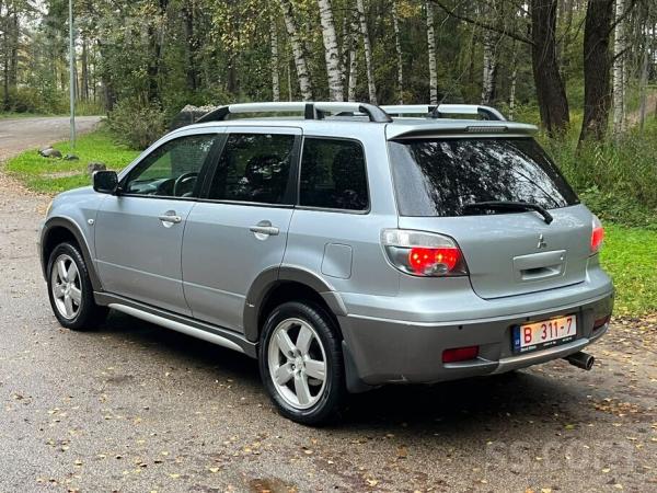 Pelēks Mitsubishi Outlander 2005 Rīga, ar dzinēja tilpumu 2.40 L un nobraukumu 0 tūkst. km par 2799 €, foto 4 vietnē AUTOMOTO.COM.LV