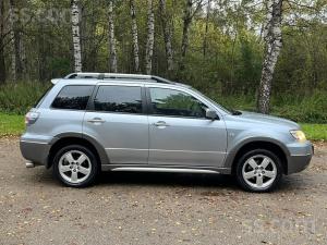 Grey Mitsubishi Outlander 2005 in Riga, with an engine capacity of 2.40 L and mileage of 0 thousand km for 2799 €, photo 7 on AUTOMOTO.COM.LV