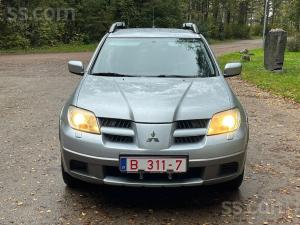 Grey Mitsubishi Outlander 2005 in Riga, with an engine capacity of 2.40 L and mileage of 0 thousand km for 2799 €, photo 9 on AUTOMOTO.COM.LV