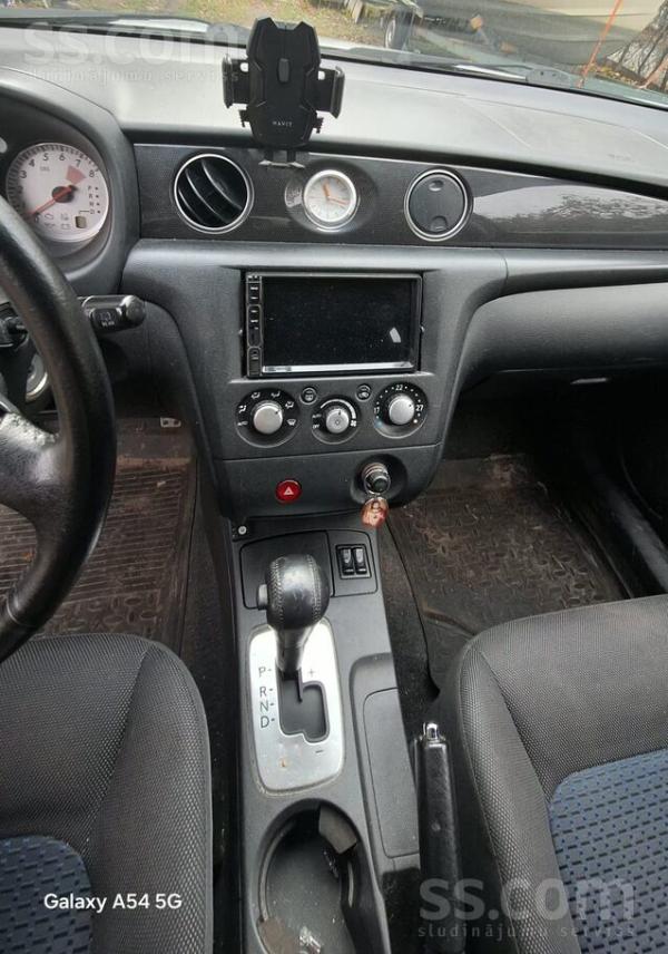 Pelēks Mitsubishi Outlander 2006 Rīga, ar dzinēja tilpumu 2.40 L un nobraukumu 371 tūkst. km par 1100 €, foto 8 vietnē AUTOMOTO.COM.LV