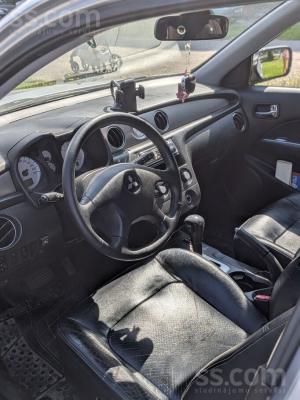 Pelēks Mitsubishi Outlander 2006 Rīga, ar dzinēja tilpumu 2.40 L un nobraukumu 219 tūkst. km par 3100 €, foto 4 vietnē AUTOMOTO.COM.LV