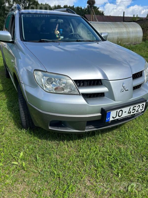 Grey Mitsubishi Outlander 2006 in Daugavpils, with an engine capacity of 2.00 L and mileage of 230 thousand km for 1650 €, photo 5 on AUTOMOTO.COM.LV