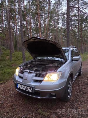 Grey Mitsubishi Outlander 2006 in Riga, with an engine capacity of 2.40 L and mileage of 219 thousand km for 2800 €, photo 6 on AUTOMOTO.COM.LV