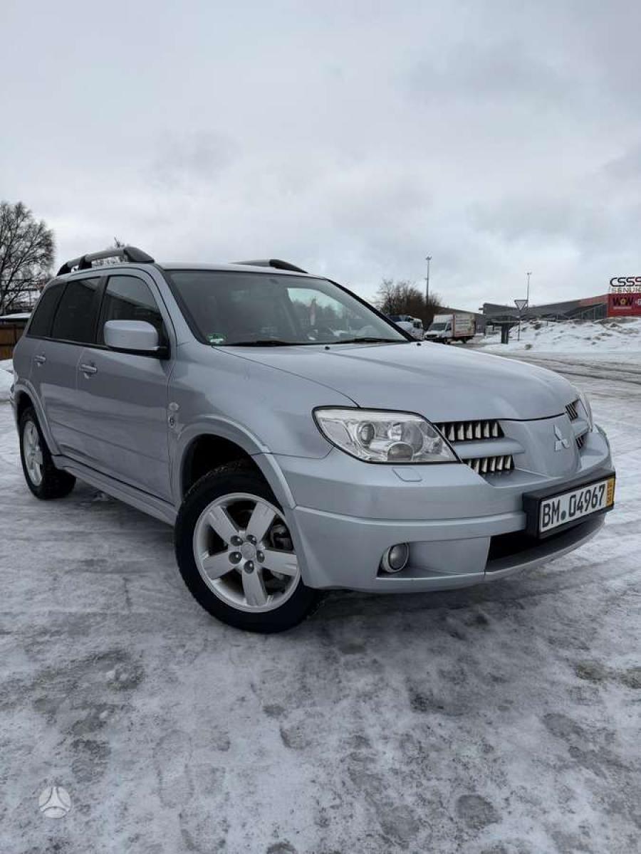 Pelēks Mitsubishi Outlander 2007 Kauņa, ar dzinēja tilpumu 2.38 L un nobraukumu 107 tūkst. km par 5700 €, foto 3 vietnē AUTOMOTO.COM.LV