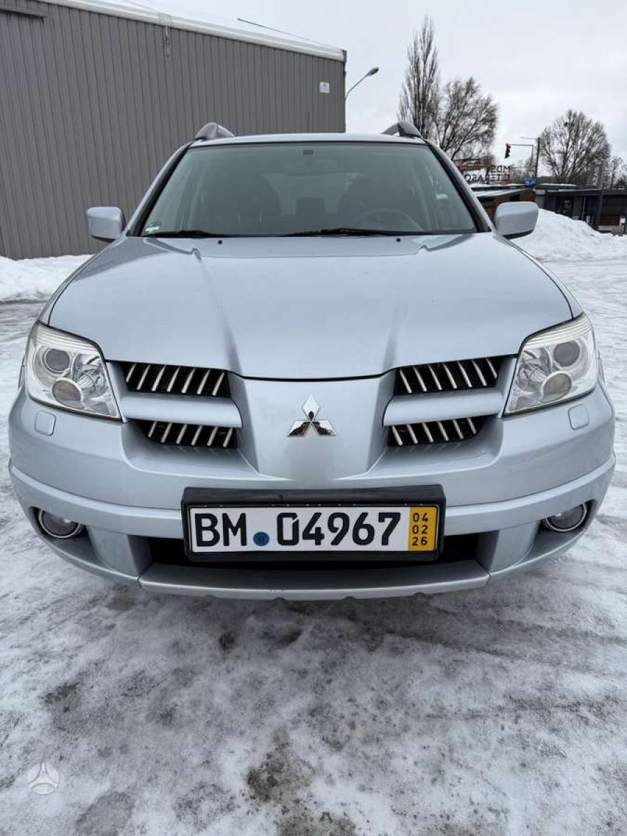 Pelēks Mitsubishi Outlander 2007 Kauņa, ar dzinēja tilpumu 2.38 L un nobraukumu 107 tūkst. km par 5700 €, foto 5 vietnē AUTOMOTO.COM.LV