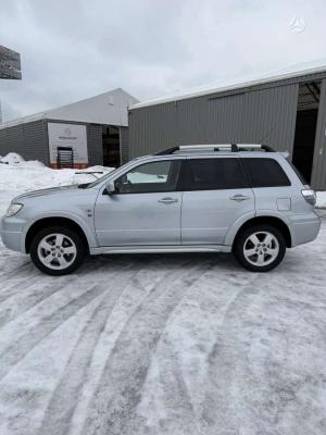 Pelēks Mitsubishi Outlander 2007 Kauņa, ar dzinēja tilpumu 2.38 L un nobraukumu 107 tūkst. km par 5700 €, foto 7 vietnē AUTOMOTO.COM.LV