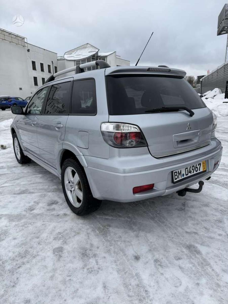 Pelēks Mitsubishi Outlander 2007 Kauņa, ar dzinēja tilpumu 2.38 L un nobraukumu 107 tūkst. km par 5700 €, foto 8 vietnē AUTOMOTO.COM.LV
