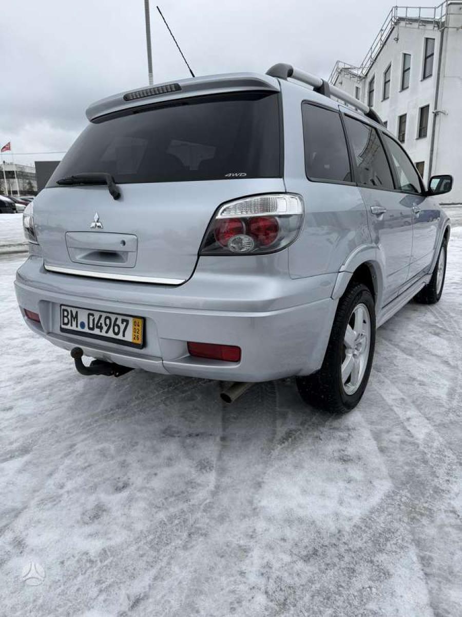 Pelēks Mitsubishi Outlander 2007 Kauņa, ar dzinēja tilpumu 2.38 L un nobraukumu 107 tūkst. km par 5700 €, foto 10 vietnē AUTOMOTO.COM.LV