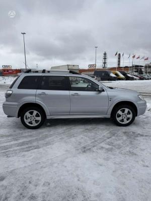 Pelēks Mitsubishi Outlander 2007 Kauņa, ar dzinēja tilpumu 2.38 L un nobraukumu 107 tūkst. km par 5700 €, foto 11 vietnē AUTOMOTO.COM.LV