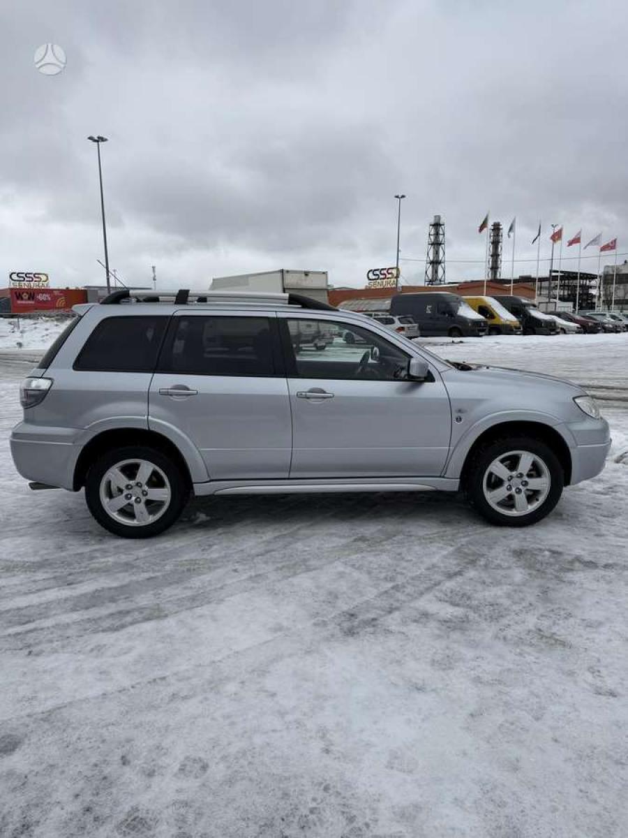 Pelēks Mitsubishi Outlander 2007 Kauņa, ar dzinēja tilpumu 2.38 L un nobraukumu 107 tūkst. km par 5700 €, foto 11 vietnē AUTOMOTO.COM.LV