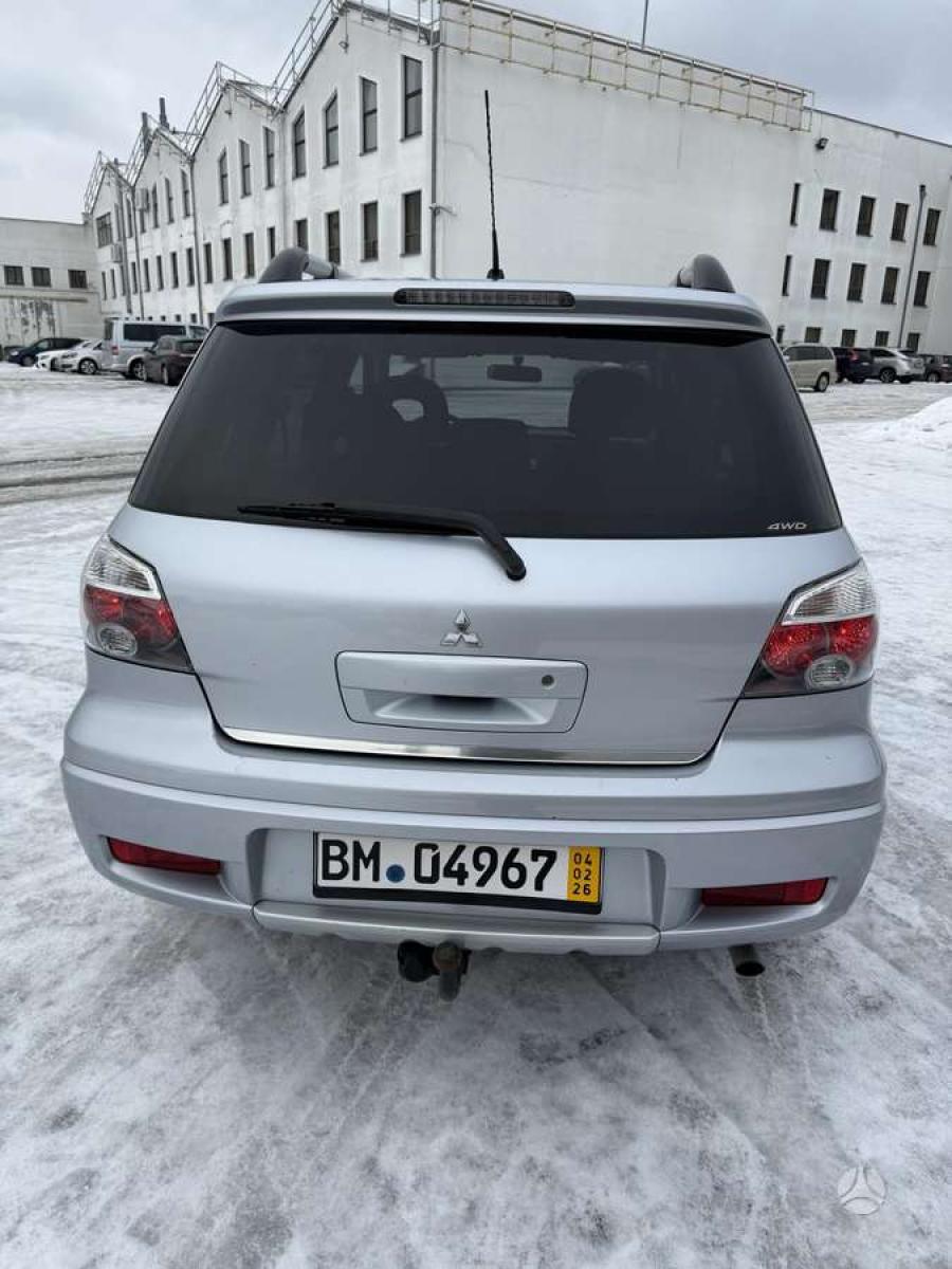 Pelēks Mitsubishi Outlander 2007 Kauņa, ar dzinēja tilpumu 2.38 L un nobraukumu 107 tūkst. km par 5700 €, foto 34 vietnē AUTOMOTO.COM.LV