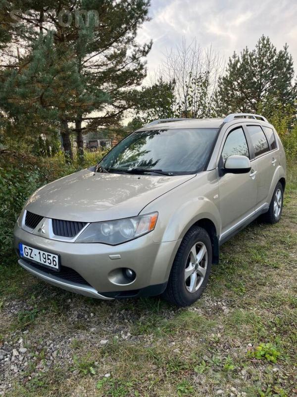 Pelēks Mitsubishi Outlander 2007 Rīga, ar dzinēja tilpumu 2.40 L un nobraukumu 215 tūkst. km par 2100 €, foto 2 vietnē AUTOMOTO.COM.LV