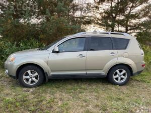 Pelēks Mitsubishi Outlander 2007 Rīga, ar dzinēja tilpumu 2.40 L un nobraukumu 215 tūkst. km par 2100 €, foto 6 vietnē AUTOMOTO.COM.LV