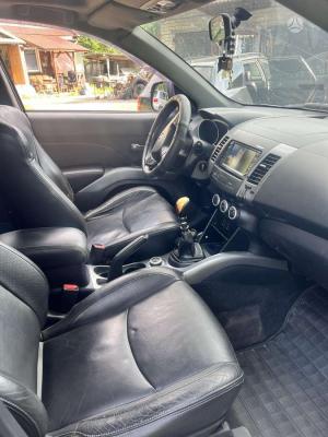 Pelēks Mitsubishi Outlander 2007 Širvintos, ar dzinēja tilpumu 1.97 L un nobraukumu 288 tūkst. km par 2600 €, foto 12 vietnē AUTOMOTO.COM.LV