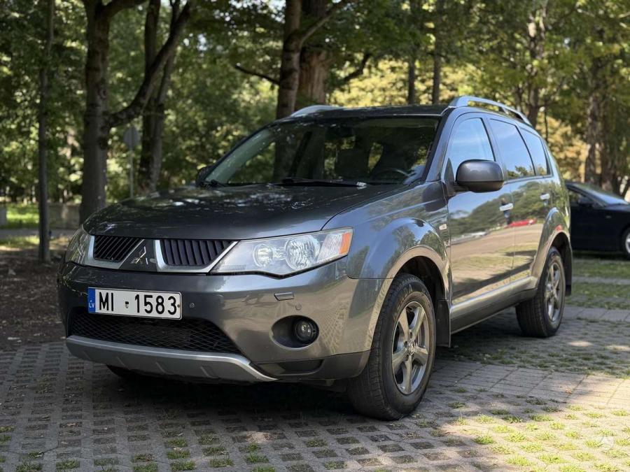 Grey Mitsubishi Outlander 2007 in Kaunas, with an engine capacity of 1.97 L and mileage of 295 thousand km for 2850 €, photo 1 on AUTOMOTO.COM.LV