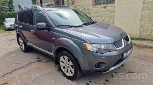 Pelēks Mitsubishi Outlander 2007 Rīga, ar dzinēja tilpumu 2.00 L un nobraukumu 339 tūkst. km par 1800 €, foto  vietnē AUTOMOTO.COM.LV