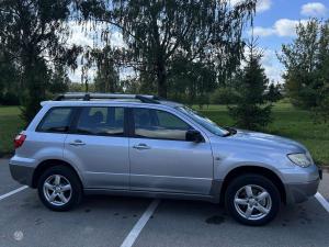 Pelēks Mitsubishi Outlander 2007 Birštonas, ar dzinēja tilpumu 2.00 L un nobraukumu 193 tūkst. km par 1849 €, foto 9 vietnē AUTOMOTO.COM.LV
