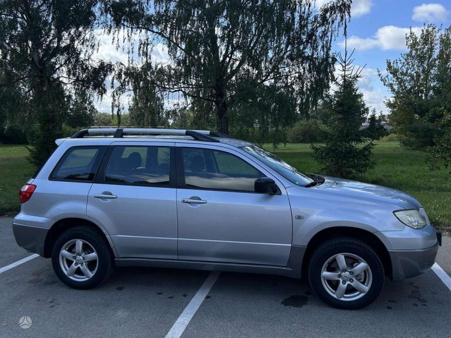 Pelēks Mitsubishi Outlander 2007 Birštonas, ar dzinēja tilpumu 2.00 L un nobraukumu 193 tūkst. km par 1849 €, foto 9 vietnē AUTOMOTO.COM.LV