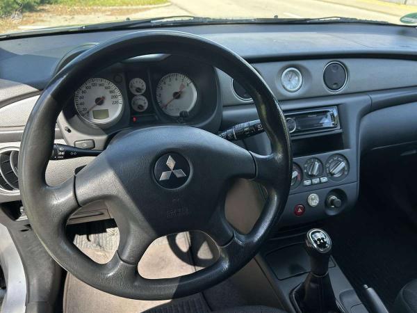 Pelēks Mitsubishi Outlander 2007 Birštonas, ar dzinēja tilpumu 2.00 L un nobraukumu 193 tūkst. km par 1849 €, foto 10 vietnē AUTOMOTO.COM.LV