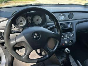 Pelēks Mitsubishi Outlander 2007 Birštonas, ar dzinēja tilpumu 2.00 L un nobraukumu 193 tūkst. km par 1849 €, foto 11 vietnē AUTOMOTO.COM.LV