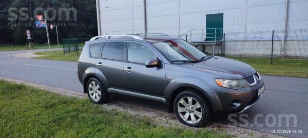 Pelēks Mitsubishi Outlander 2008 Rīga, ar dzinēja tilpumu 2.40 L un nobraukumu 276 tūkst. km par 2350 €, foto 5 vietnē AUTOMOTO.COM.LV
