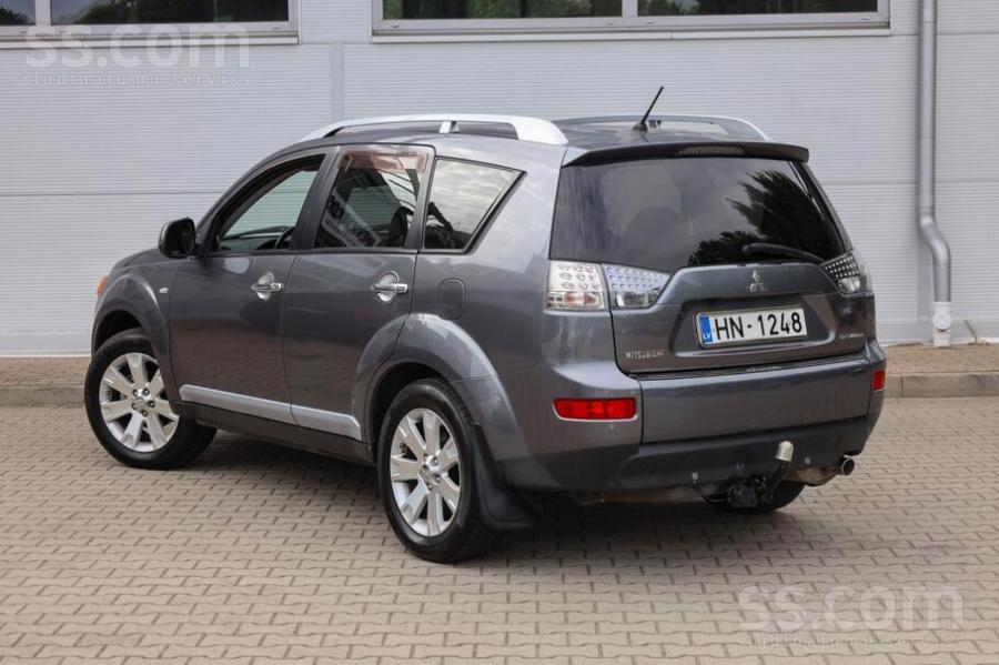 Pelēks Mitsubishi Outlander 2008 Rīga, ar dzinēja tilpumu 2.40 L un nobraukumu 308 tūkst. km par 3495 €, foto 6 vietnē AUTOMOTO.COM.LV