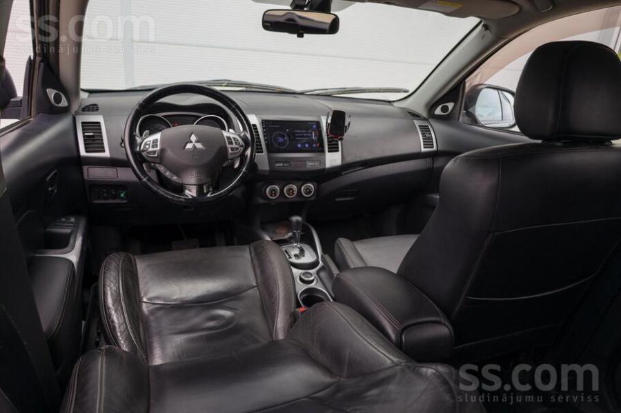 Pelēks Mitsubishi Outlander 2008 Rīga, ar dzinēja tilpumu 2.40 L un nobraukumu 308 tūkst. km par 3495 €, foto 14 vietnē AUTOMOTO.COM.LV