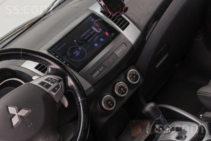Pelēks Mitsubishi Outlander 2008 Rīga, ar dzinēja tilpumu 2.40 L un nobraukumu 308 tūkst. km par 3495 €, foto 15 vietnē AUTOMOTO.COM.LV