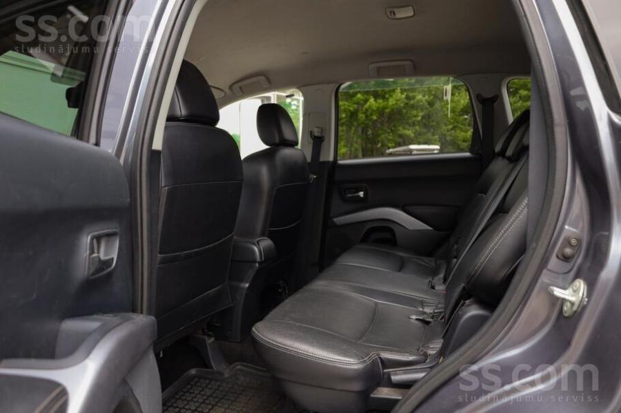 Pelēks Mitsubishi Outlander 2008 Rīga, ar dzinēja tilpumu 2.40 L un nobraukumu 308 tūkst. km par 3495 €, foto 16 vietnē AUTOMOTO.COM.LV