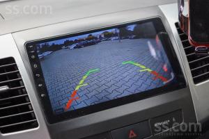 Pelēks Mitsubishi Outlander 2008 Rīga, ar dzinēja tilpumu 2.40 L un nobraukumu 308 tūkst. km par 3495 €, foto 23 vietnē AUTOMOTO.COM.LV
