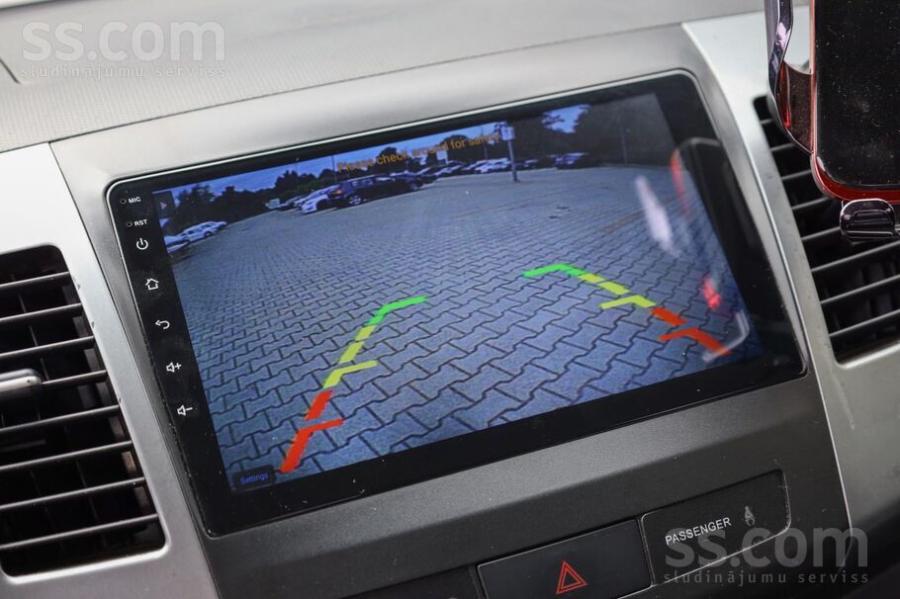 Pelēks Mitsubishi Outlander 2008 Rīga, ar dzinēja tilpumu 2.40 L un nobraukumu 308 tūkst. km par 3495 €, foto 23 vietnē AUTOMOTO.COM.LV