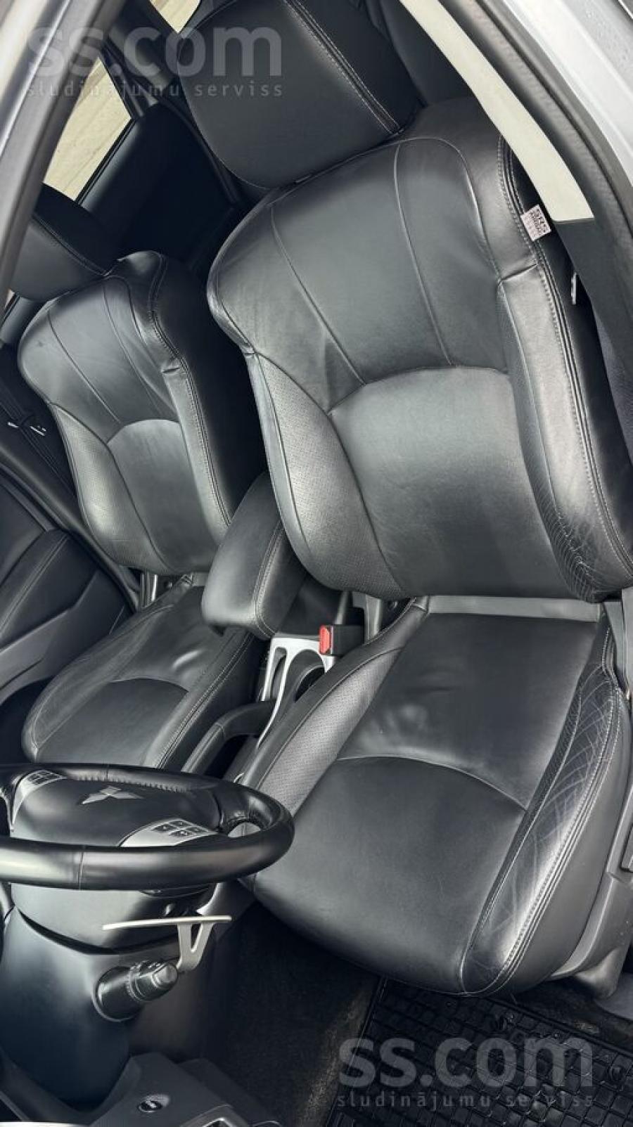 Pelēks Mitsubishi Outlander 2008 Rīga, ar dzinēja tilpumu 2.40 L un nobraukumu 145 tūkst. km par 5200 €, foto 7 vietnē AUTOMOTO.COM.LV