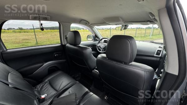 Pelēks Mitsubishi Outlander 2008 Rīga, ar dzinēja tilpumu 2.40 L un nobraukumu 145 tūkst. km par 5200 €, foto 8 vietnē AUTOMOTO.COM.LV