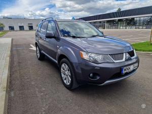 Grey Mitsubishi Outlander 2008 in Kaunas, with an engine capacity of 2.18 L and mileage of 240 thousand km for 4500 €, photo 6 on AUTOMOTO.COM.LV