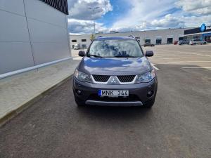 Grey Mitsubishi Outlander 2008 in Kaunas, with an engine capacity of 2.18 L and mileage of 240 thousand km for 4500 €, photo 7 on AUTOMOTO.COM.LV