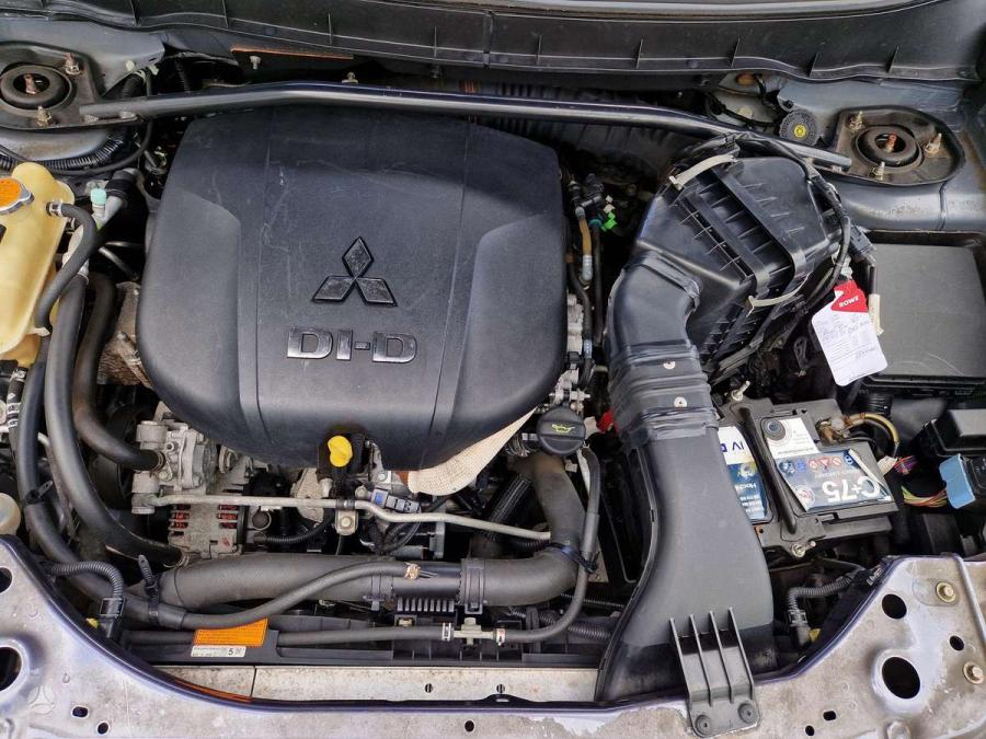 Grey Mitsubishi Outlander 2008 in Kaunas, with an engine capacity of 2.18 L and mileage of 240 thousand km for 4500 €, photo 22 on AUTOMOTO.COM.LV