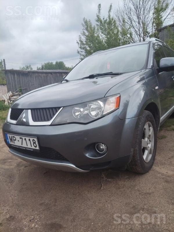 Pelēks Mitsubishi Outlander 2009 Daugavpils, ar dzinēja tilpumu 2.00 L un nobraukumu 283 tūkst. km par 3200 €, foto 1 vietnē AUTOMOTO.COM.LV