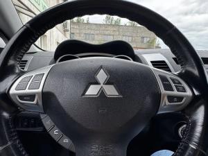 Grey Mitsubishi Outlander 2009 in Daugavpils, with an engine capacity of 2.20 L and mileage of 253 thousand km for 4300 €, photo 18 on AUTOMOTO.COM.LV
