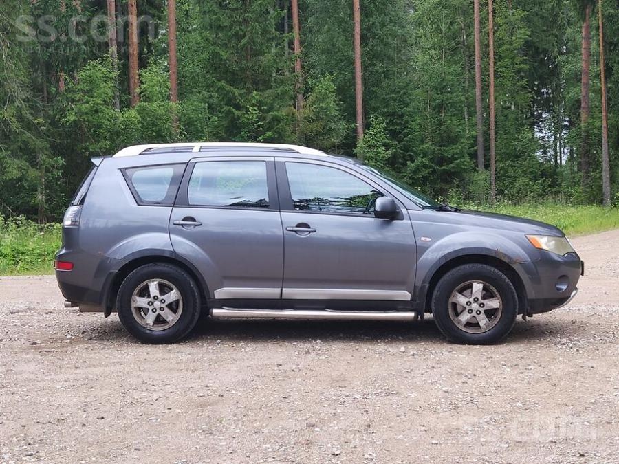 Pelēks Mitsubishi Outlander 2009 Talsi, ar dzinēja tilpumu 2.00 L un nobraukumu 405 tūkst. km par 1950 €, foto 3 vietnē AUTOMOTO.COM.LV