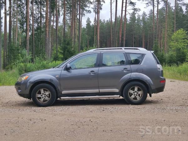 Pelēks Mitsubishi Outlander 2009 Talsi, ar dzinēja tilpumu 2.00 L un nobraukumu 405 tūkst. km par 1950 €, foto 4 vietnē AUTOMOTO.COM.LV