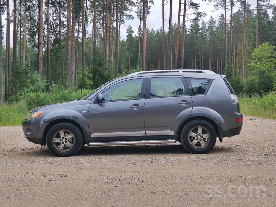 Pelēks Mitsubishi Outlander 2009 Talsi, ar dzinēja tilpumu 2.00 L un nobraukumu 405 tūkst. km par 1950 €, foto 5 vietnē AUTOMOTO.COM.LV