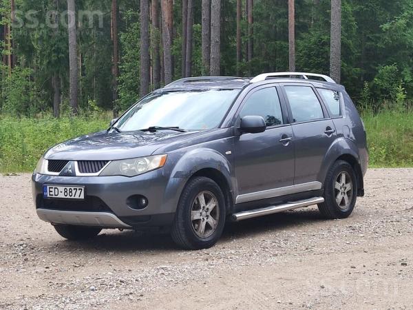 Pelēks Mitsubishi Outlander 2009 Talsi, ar dzinēja tilpumu 2.00 L un nobraukumu 405 tūkst. km par 1950 €, foto 5 vietnē AUTOMOTO.COM.LV