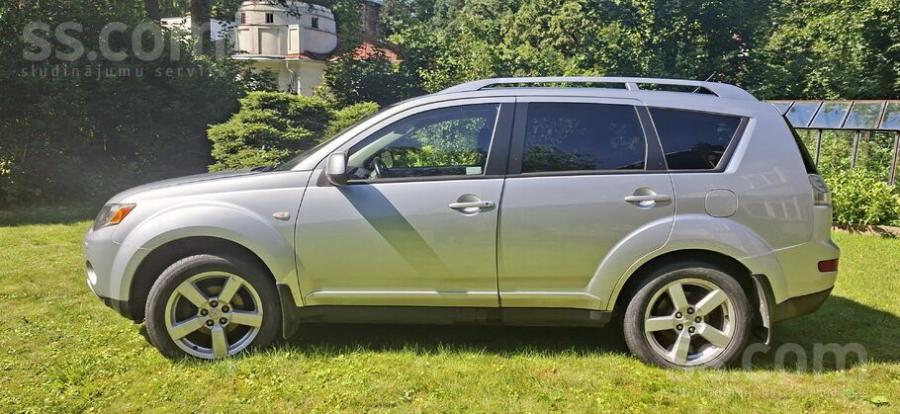 Pelēks Mitsubishi Outlander 2009 Rīga, ar dzinēja tilpumu 2.00 L un nobraukumu 154 tūkst. km par 3500 €, foto 4 vietnē AUTOMOTO.COM.LV