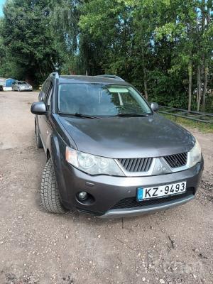 Pelēks Mitsubishi Outlander 2009 Preiļi, ar dzinēja tilpumu 2.40 L un nobraukumu 332 tūkst. km par 1350 €, foto  vietnē AUTOMOTO.COM.LV