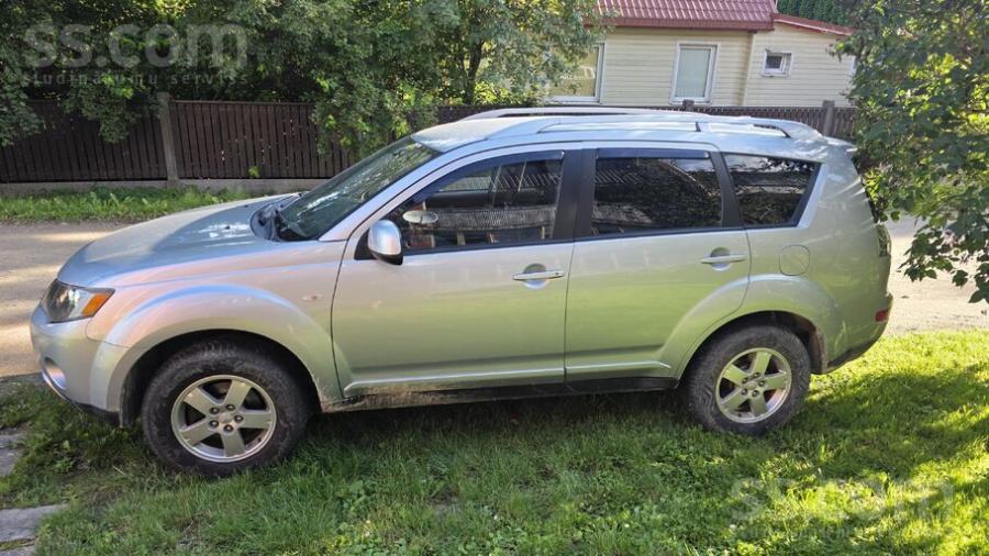 Pelēks Mitsubishi Outlander 2009 Aizkraukle, ar dzinēja tilpumu 2.40 L un nobraukumu 244 tūkst. km par 3800 €, foto 6 vietnē AUTOMOTO.COM.LV