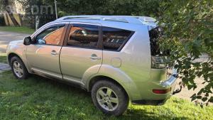 Pelēks Mitsubishi Outlander 2009 Aizkraukle, ar dzinēja tilpumu 2.40 L un nobraukumu 244 tūkst. km par 3800 €, foto 7 vietnē AUTOMOTO.COM.LV